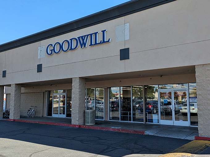 Blue letters against beige brick announce this temple of thrift to bargain hunters and vintage enthusiasts alike.