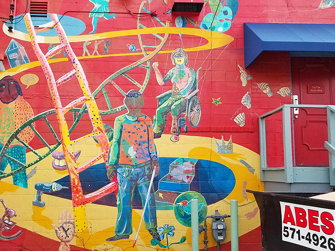The vibrant mural outside Tip Top tells you this isn't your average thrift store&mdash;it's an artistic treasure hunt waiting to happen.