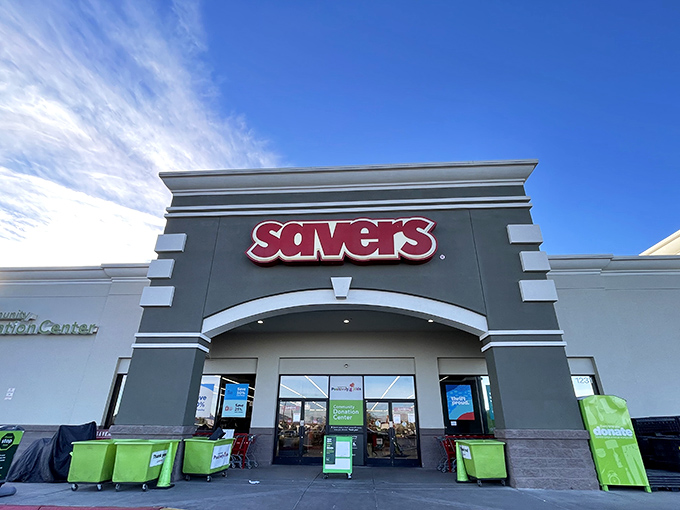 The treasure hunt begins! Savers' distinctive gray and red facade in Henderson promises adventure for bargain hunters beneath the brilliant Nevada sky.