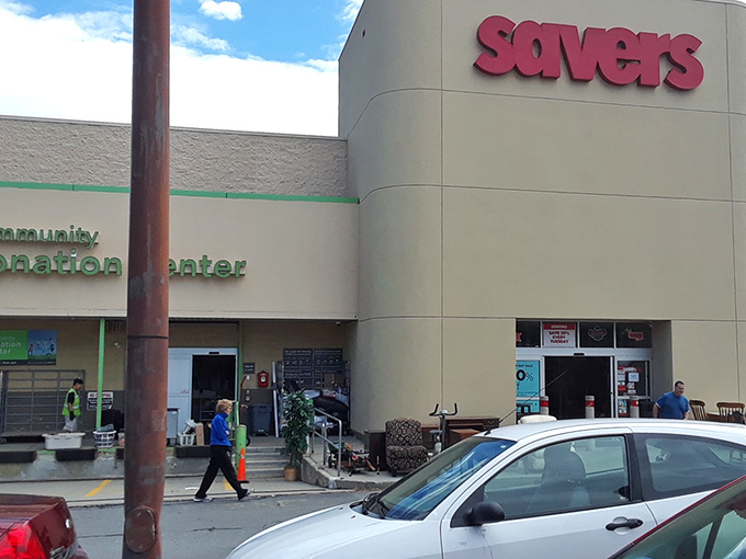The iconic red Savers sign beckons bargain hunters like a retail lighthouse guiding ships full of empty closets to safe harbor.