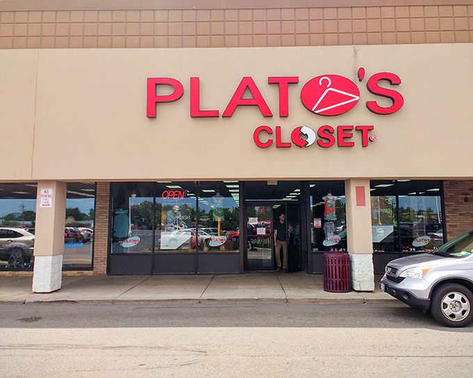 The bright red Plato's Closet sign beckons like a fashion lighthouse, guiding bargain hunters to this Rochester treasure trove of second-hand style.