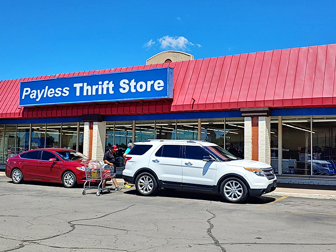 The entrance beckons with promises of color-coded bargains. That sign might as well say "Abandon all budget plans, ye who enter here."