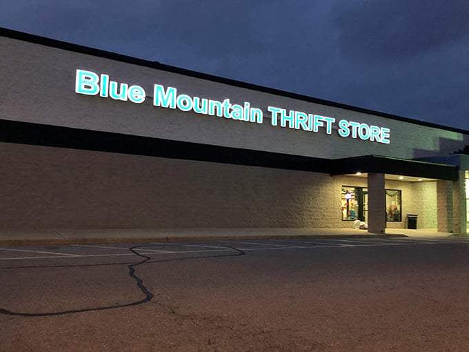 As dusk settles over Palmyra, Blue Mountain's illuminated sign glows with promise &ndash; a lighthouse guiding night owls to secondhand shores.