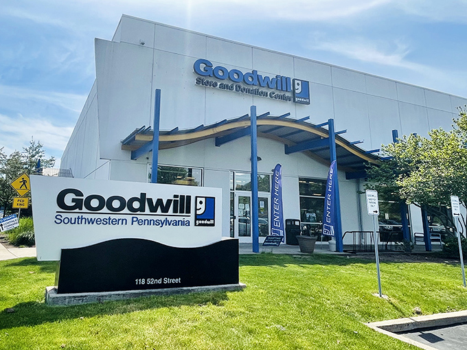 The unassuming exterior of Goodwill's 52nd Street location hides a treasure trove within. Like finding an uncut diamond at a garage sale, the real magic happens once you step inside.