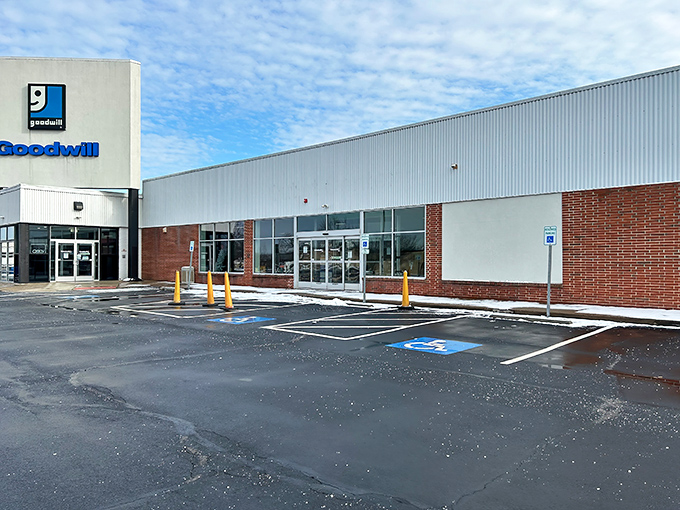 The iconic blue Goodwill smile logo welcomes bargain hunters to this Montgomeryville treasure trove, where fashion finds await the patient explorer.