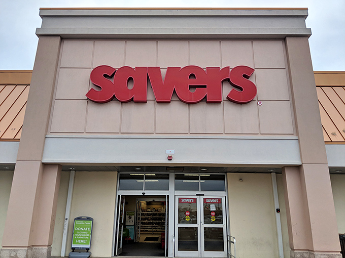 The iconic red Savers sign beckons like a lighthouse for bargain hunters. Treasure awaits behind those unassuming doors!