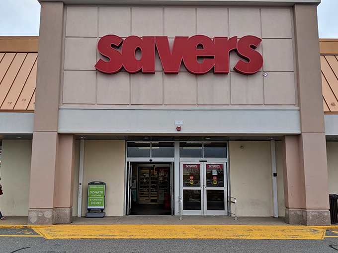 The iconic red Savers sign beckons like a lighthouse for treasure hunters. Inside awaits a wonderland of possibilities and second chances.