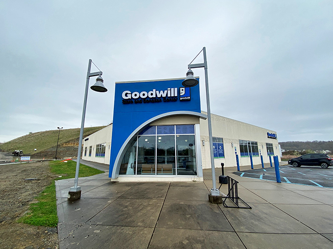 The iconic blue facade of Goodwill in White Hall stands ready for treasure hunters, complete with those charming bells that practically announce: "Bargains ahead!"