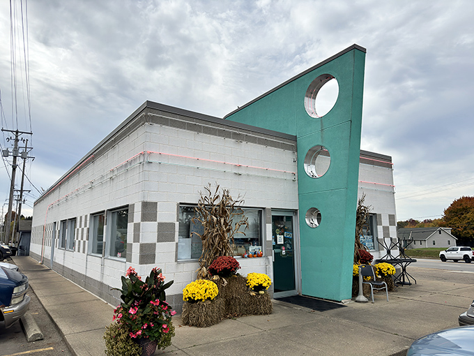 Fall decorations frame the entrance to this checkerboard time capsule, where biscuits and gravy aren't just a menu item&mdash;they're a religious experience.