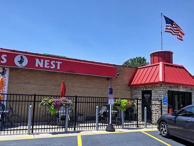 The bright red awning of The Crow's Nest stands out like a culinary lighthouse on Ashtabula's shoreline, complete with its dapper crow mascot keeping watch.