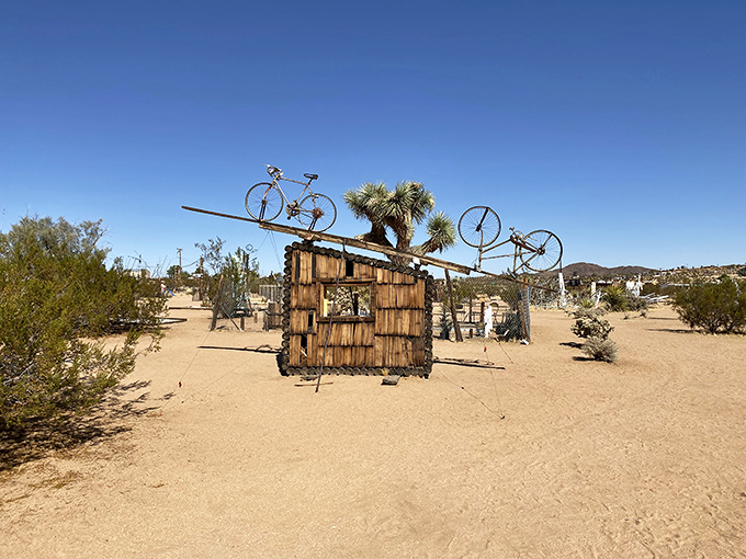 The desert's version of a yellow brick road? These curved metal arches lead visitors through a surreal gateway between our world and artistic imagination.
