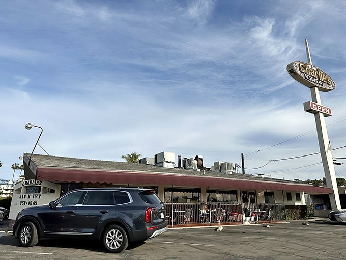 The classic roadside sign beckons like an old friend &ndash; Charlie's Family Restaurant stands proudly against the California sky, promising comfort food that transcends time.