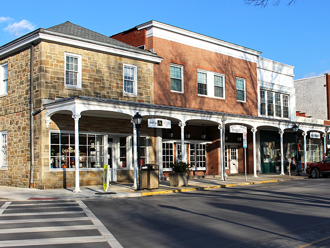 Autumn transforms Ligonier into a painter's palette of crimson, gold, and amber, with the town nestled perfectly among rolling hills like a Norman Rockwell scene come to life.