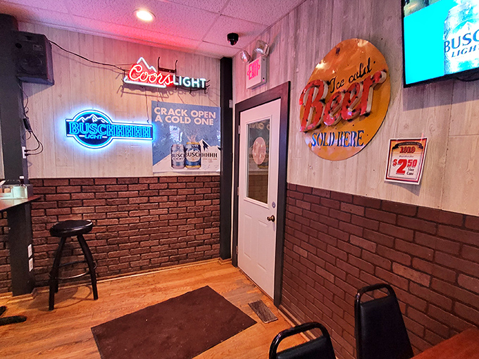 The classic brick-and-wood interior at The Fort feels like stepping into a time capsule where neon beer signs still reign supreme and conversations flow freely.