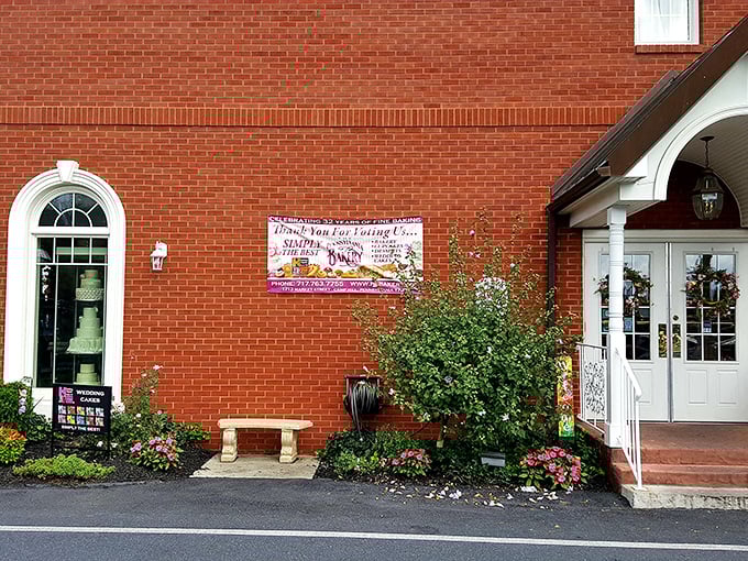 The brick fa&ccedil;ade of The Pennsylvania Bakery stands like a temple to temptation, promising sweet salvation behind those white-trimmed doors.