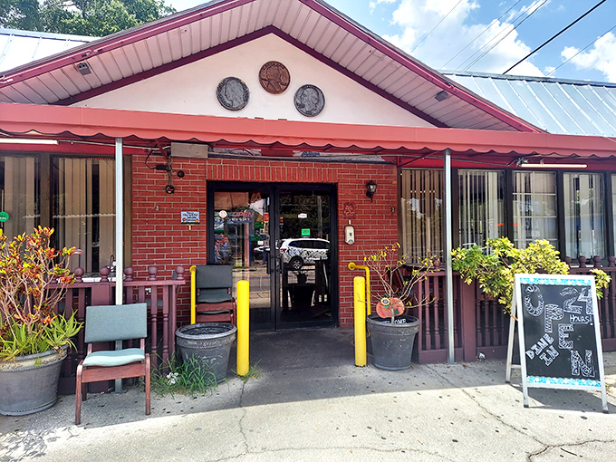 The pink-trimmed facade of Three Coins Diner stands like a time capsule of Americana, complete with decorative coins that inspired its name.
