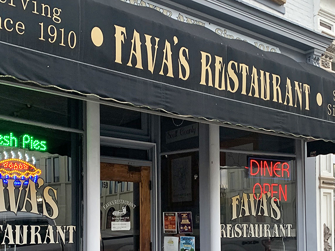 The iconic awning of Favas 1910 Diner beckons hungry travelers like a culinary lighthouse in downtown Georgetown.