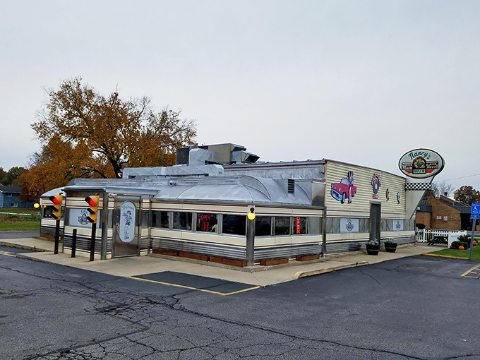 The classic silver-sided exterior of Nancy's Main Street Diner gleams in the Ohio sunshine, a time capsule of Americana waiting to welcome hungry travelers.