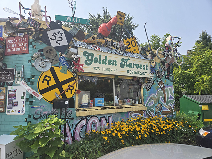 The building that taste forgot but flavor remembered. Golden Harvest's exterior is a psychedelic roadside attraction that happens to serve breakfast.