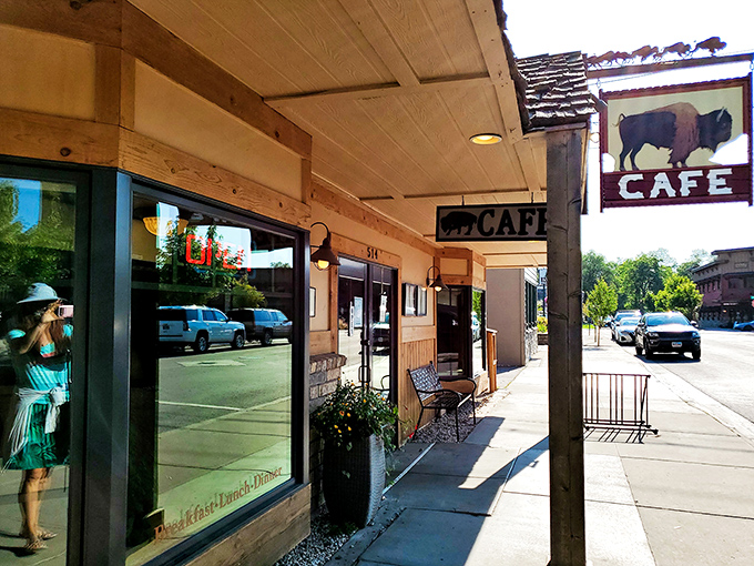 The iconic buffalo sign welcomes hungry travelers like a beacon of breakfast hope on Whitefish's Central Avenue.