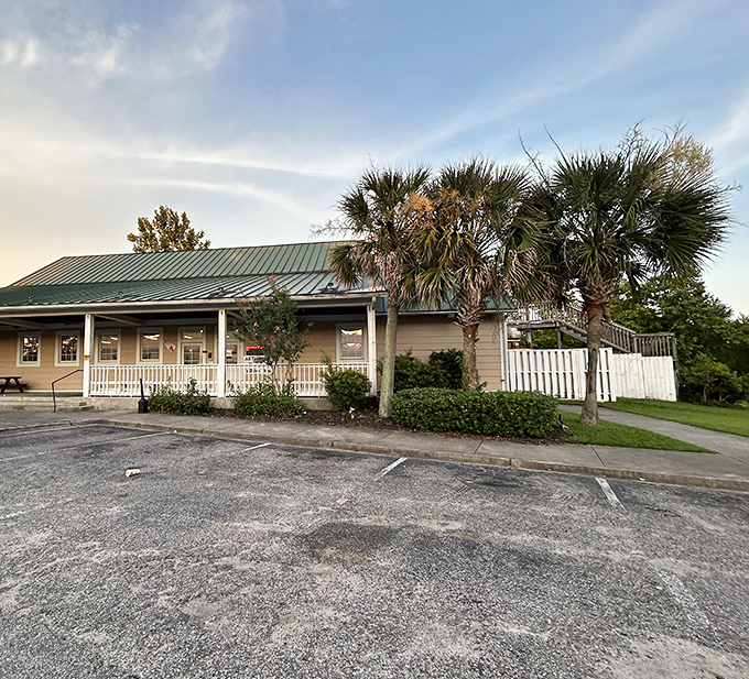 The unassuming exterior promises what fancy restaurants rarely deliver: food that makes you forget your manners and reach for seconds without apology.