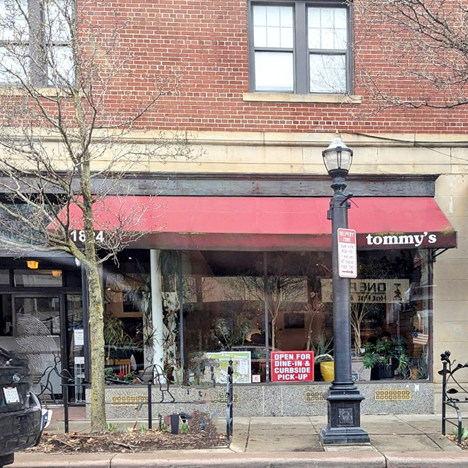 The iconic red awning of Tommy's beckons hungry pilgrims to Cleveland Heights like a culinary lighthouse guiding ships to shore.