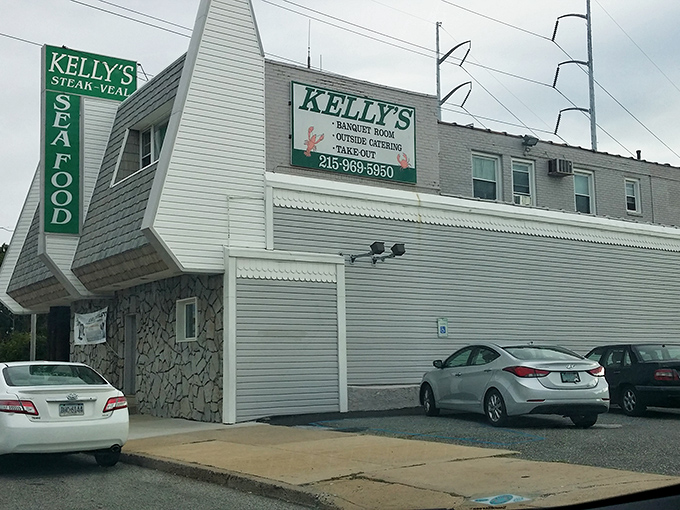 The unmistakable stone-and-shingle fortress of flavor stands proudly on a Philadelphia corner, its green sign a beacon for seafood pilgrims seeking crab cake nirvana.