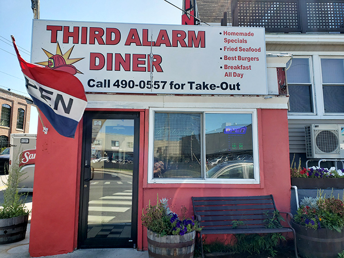 Small but mighty, this fire-engine red diner proudly flies its "OPEN" flag&mdash;a welcome signal to famished Sanford locals.