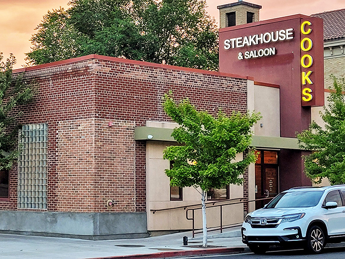 The modest exterior of Cooks Steakhouse & Saloon rises like a beacon for meat lovers in downtown Elko, promising hearty, flavor-packed treasures inside.
