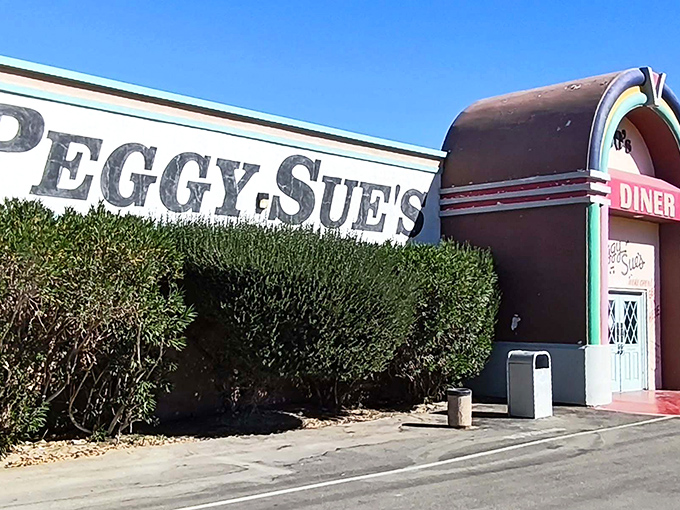 The rainbow-arched entrance to Peggy Sue's isn't just a doorway&mdash;it's a time portal disguised as the most cheerful building in the Mojave Desert.
