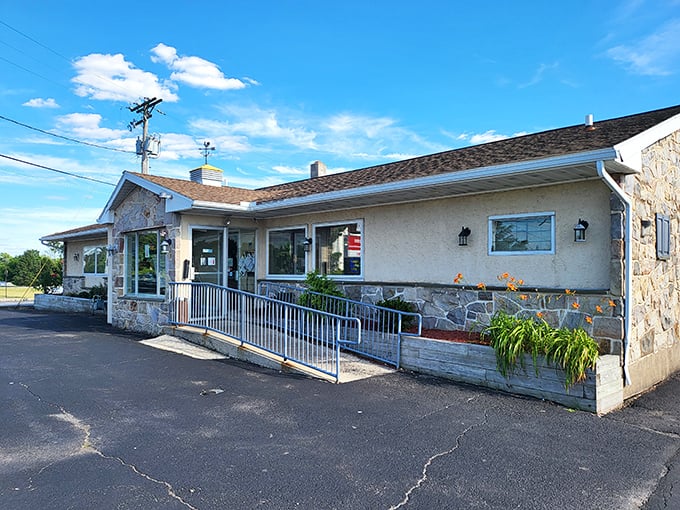 The stone-faced exterior of Sunset Family Restaurant stands like a humble guardian of breakfast treasures, welcoming hungry travelers with its unpretentious charm.
