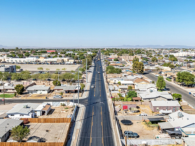 Yuma stretches toward the horizon like a desert mirage made real, where wide streets and modest homes create an affordable paradise for retirees.