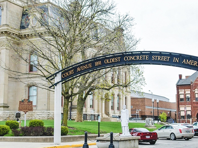 That archway isn't just marking a street&mdash;it's announcing America's oldest concrete thoroughfare like a trophy case for pavement.