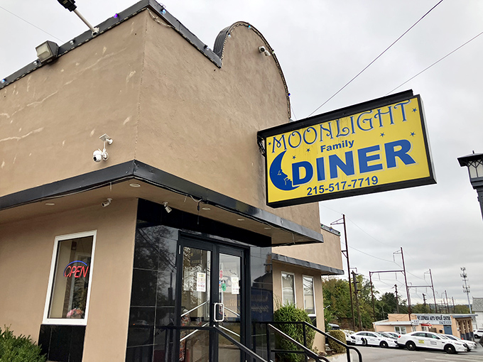 The humble tan exterior with that bright yellow sign promises what every great diner should: no pretension, just honest-to-goodness food that'll make your morning.