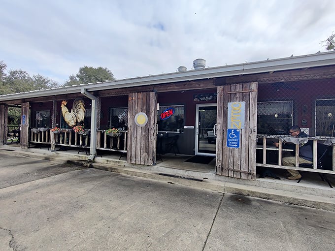 The rustic wooden exterior of Osteen Diner stands as a time capsule of Old Florida charm, promising authentic comfort food within its weathered walls.