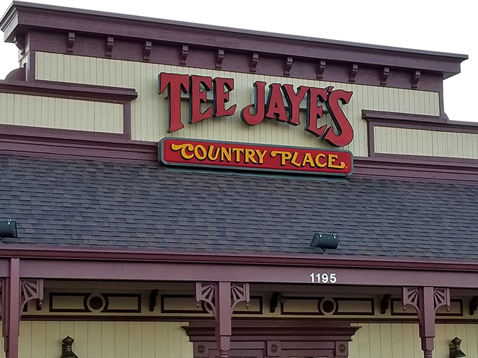 The iconic red signage of Tee Jaye's stands out like a beacon for hungry travelers. This isn't just a restaurant—it's a promise of comfort.