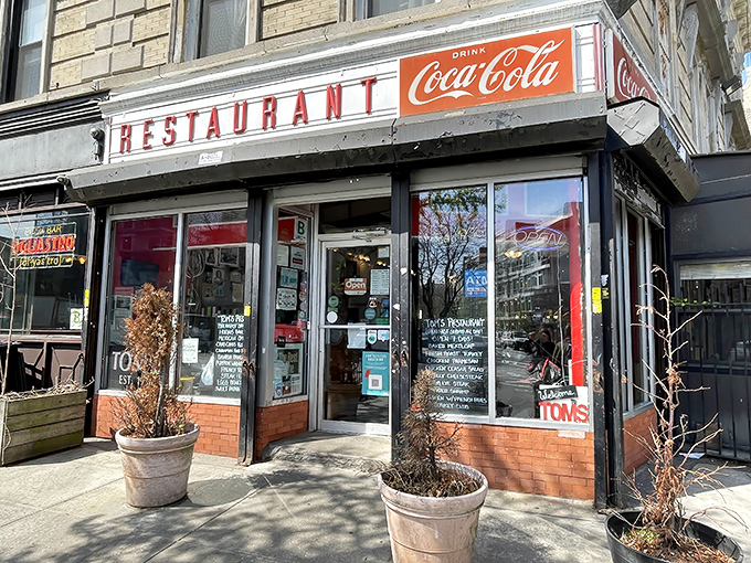 That classic Coca-Cola signage isn't just decoration—it's a time portal to when diners were the beating heart of New York neighborhoods.