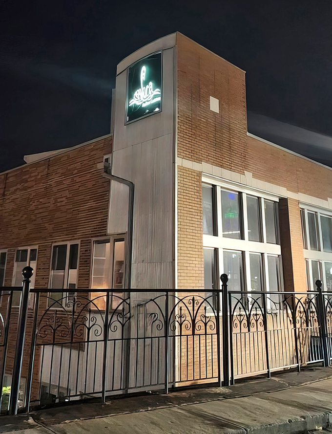 By night, Casa La Luna's illuminated exterior transforms into a beacon for hungry souls. That glowing sign might as well say "pasta paradise ahead."
