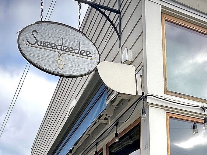 The wooden sign swinging above Sweedeedee's entrance is like a secret handshake &ndash; those who know, know. Portland breakfast magic awaits.