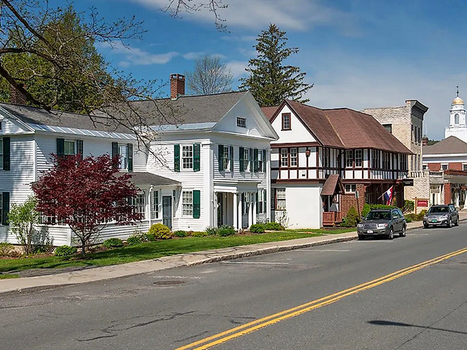 Quintessential New England charm on full display. Lenox's historic homes stand like architectural time travelers, their white clapboard and Tudor facades whispering stories of Gilded Age splendor.