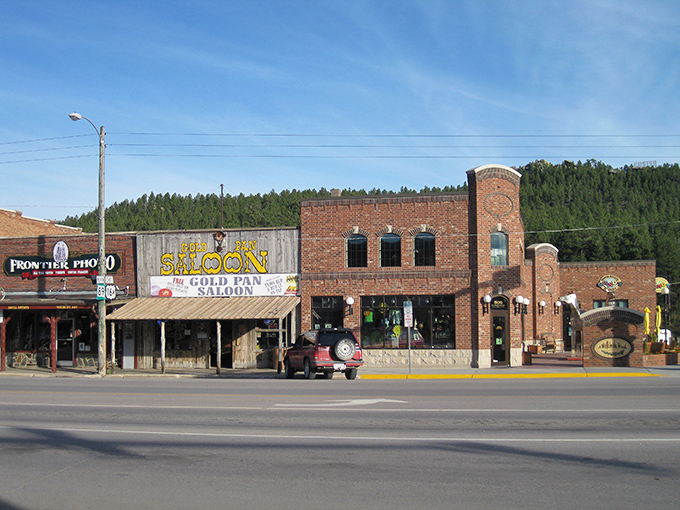Downtown Custer's historic brick buildings stand proud along Mount Rushmore Road, where Western heritage meets welcoming small-town charm every single day.