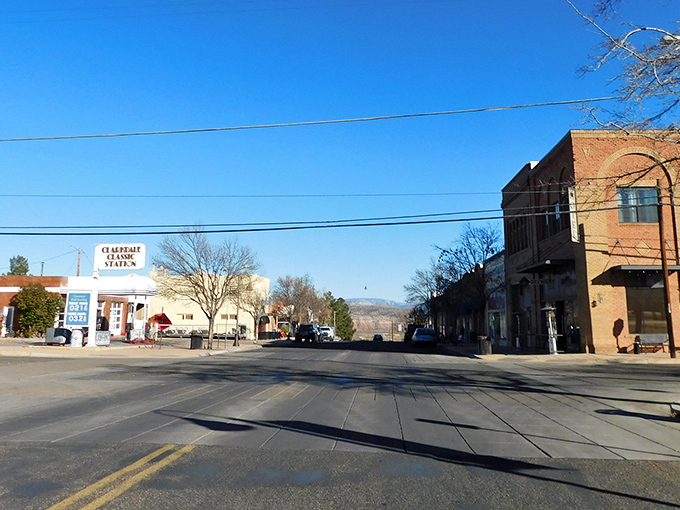Clarkdale&rsquo;s Main Street sits quiet under a bright Arizona sky, framed by historic brick buildings and wide-open views of the surrounding hills.