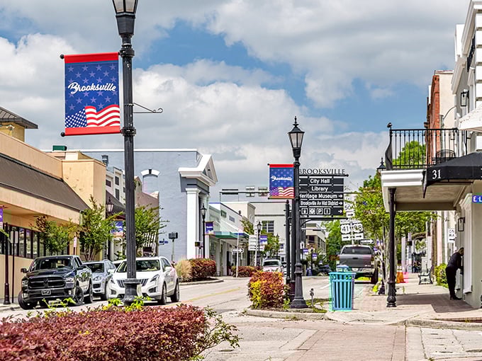 Downtown Brooksville serves up patriotic charm with American flag banners lining streets that feel like a Norman Rockwell painting came to life.