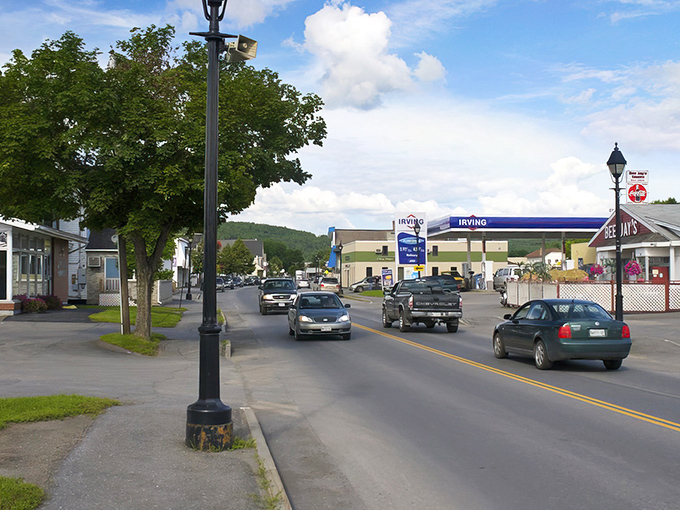 Main Street in Fort Kent, where rush hour means three cars at a stop sign and everyone still waves as they pass by.