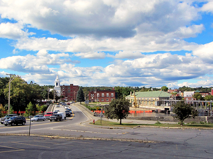 Downtown Skowhegan unfolds like a Norman Rockwell painting come to life, where church steeples and brick buildings create that perfect New England postcard moment.
