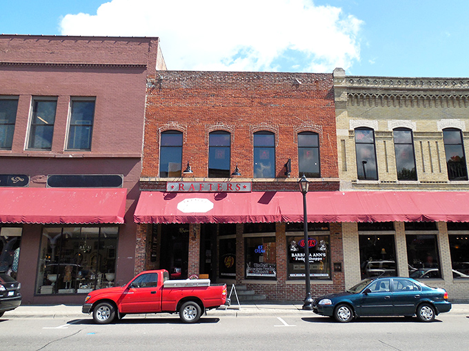 Red awnings beckon shoppers into Rafters and neighboring boutiques, where browsing becomes an afternoon adventure rather than a mere errand.