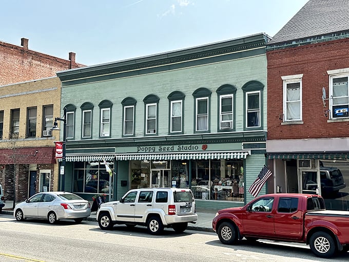 Historic storefronts line Main Street where buildings still remember when shopping meant more than clicking "add to cart."