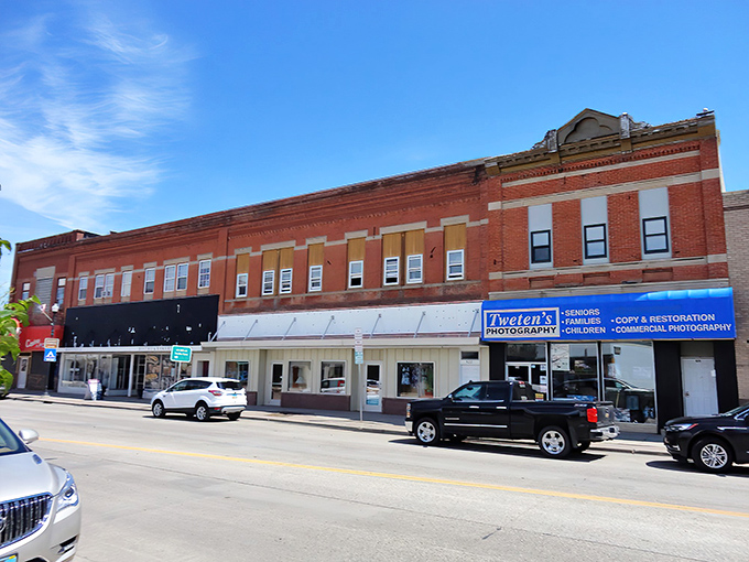 Downtown Grafton's classic brick buildings stand as steadfast sentinels of small-town charm, where history and daily life blend seamlessly on Hill Avenue.