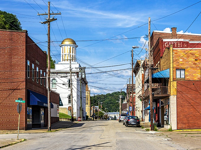 Main Street Pomeroy, where time slows down and your dollar stretches further. That gleaming white courthouse dome isn't just architecture&mdash;it's a beacon of affordable living.