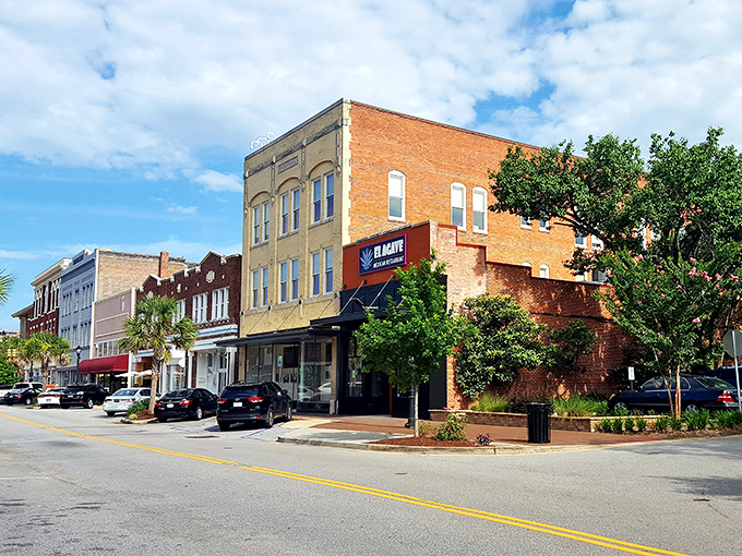 Historic brick buildings line Florence's downtown streets, where small-town charm meets big-city amenities without the big-city price tag.